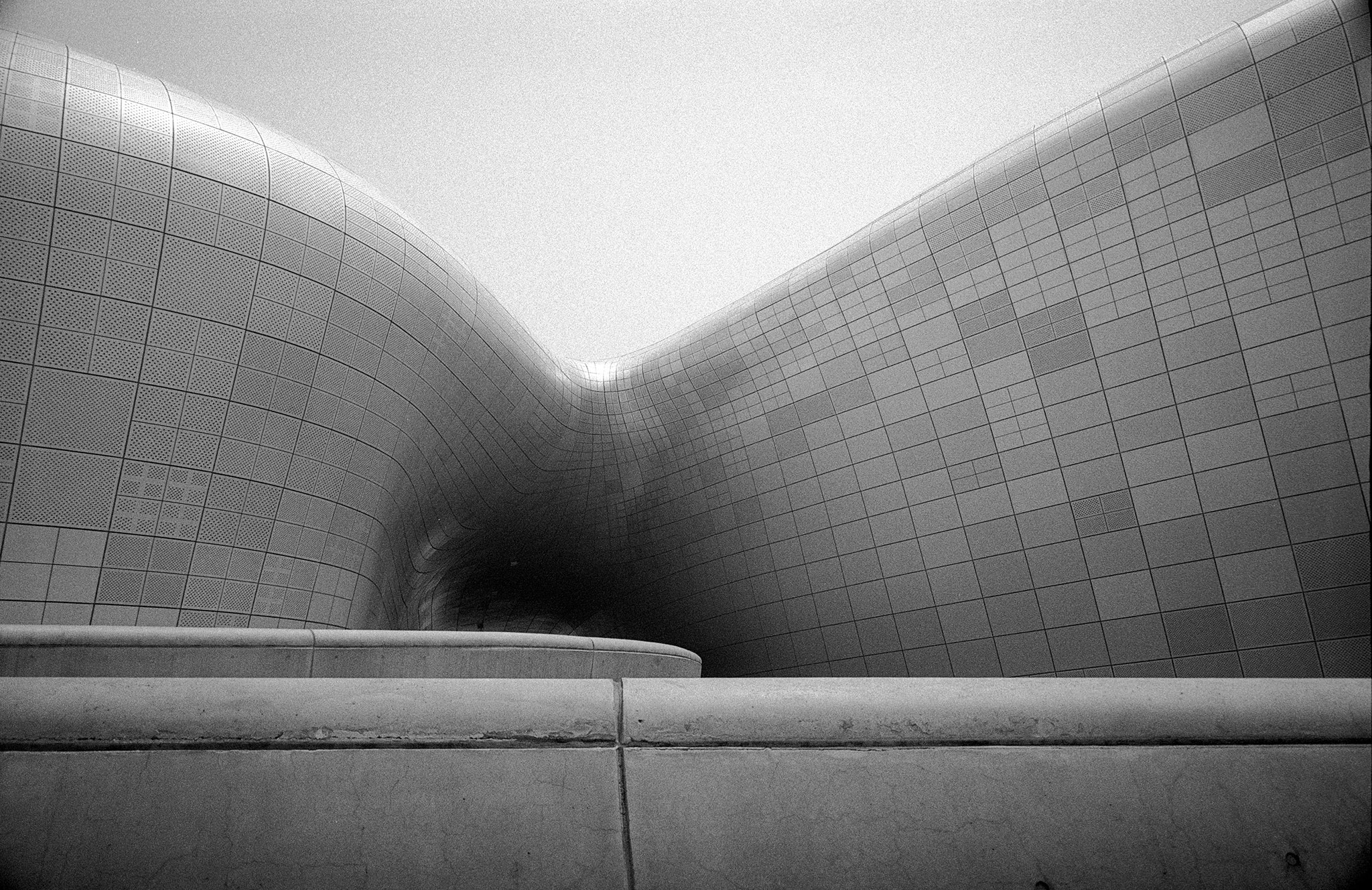 '25mm Topogon 1:4' and '2.5cm W-NIKKOR-C 1:4'